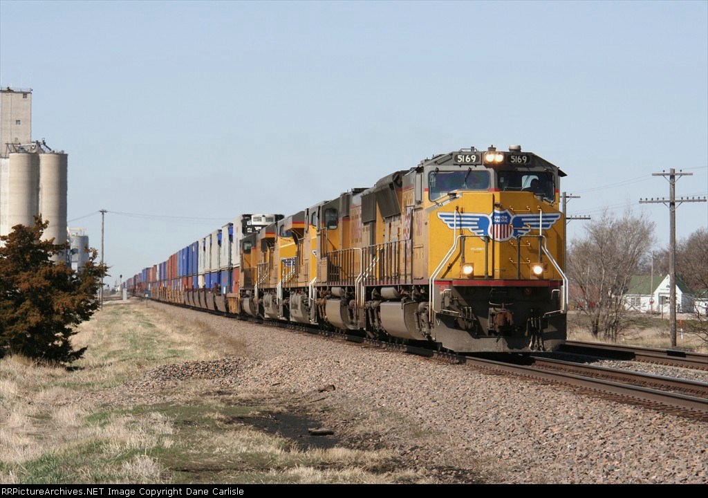 UP 5169 charges E/B with its Stacktrain